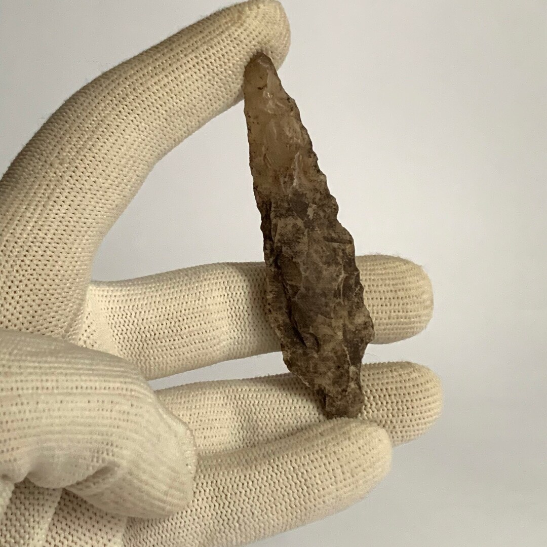 Stone Tip. Neolithic Era. Ancient Stone Tip. Neolithic Artifact ...