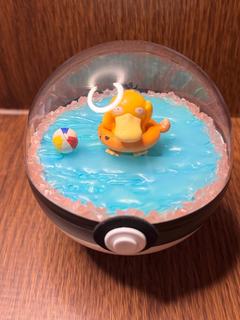Handcrafted Psyduck Pool Float Pokémon Terrarium | Glow-in-the-dark ...