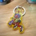 Splatoon Octoling Charm keychain Yellow and Purple - Etsy