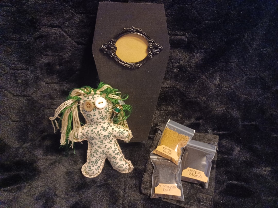 Voodoo Doll in Coffin Box With Pin, Corpse Blood, Bone Dust, and ...