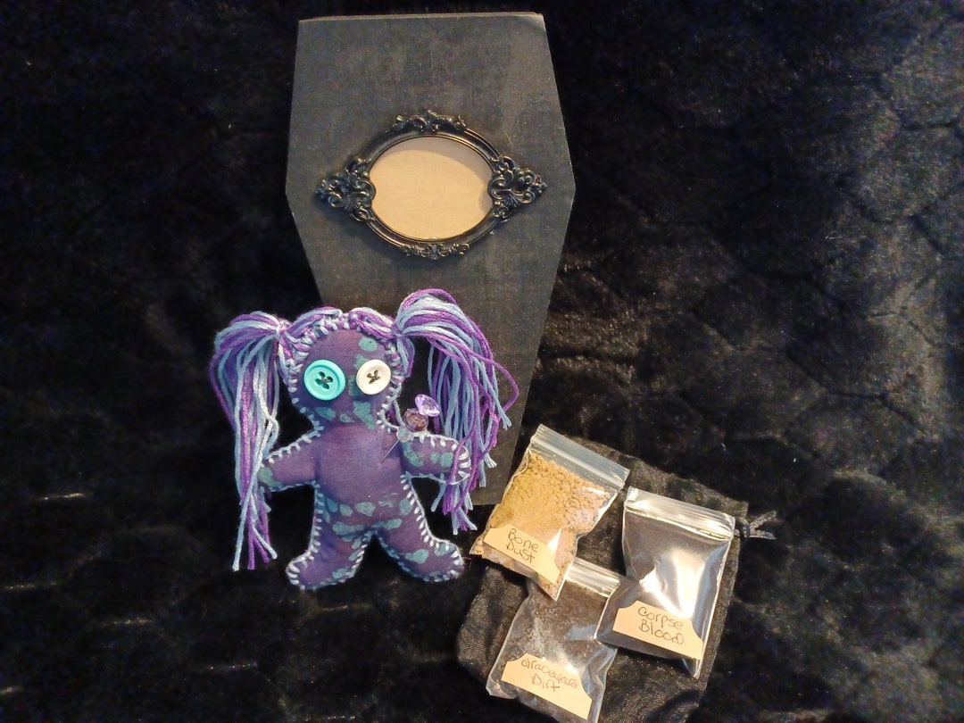 Voodoo Doll in Coffin Box With Pin, Corpse Blood, Bone Dust, and ...