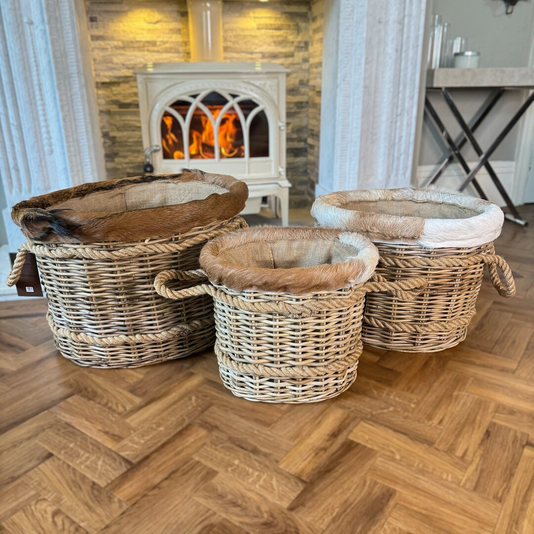 Oval Hessian Lined Rattan Log Basket With a Goat Skin Rim Finished in ...