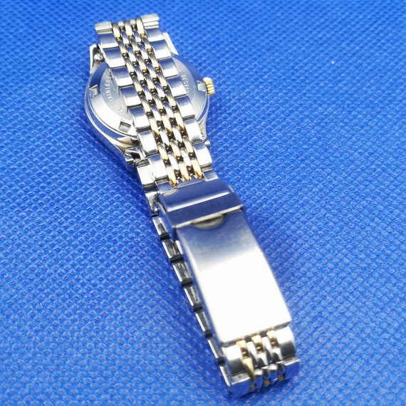 Vintage and rare Christian Mode gold color Swiss auto… - Gem