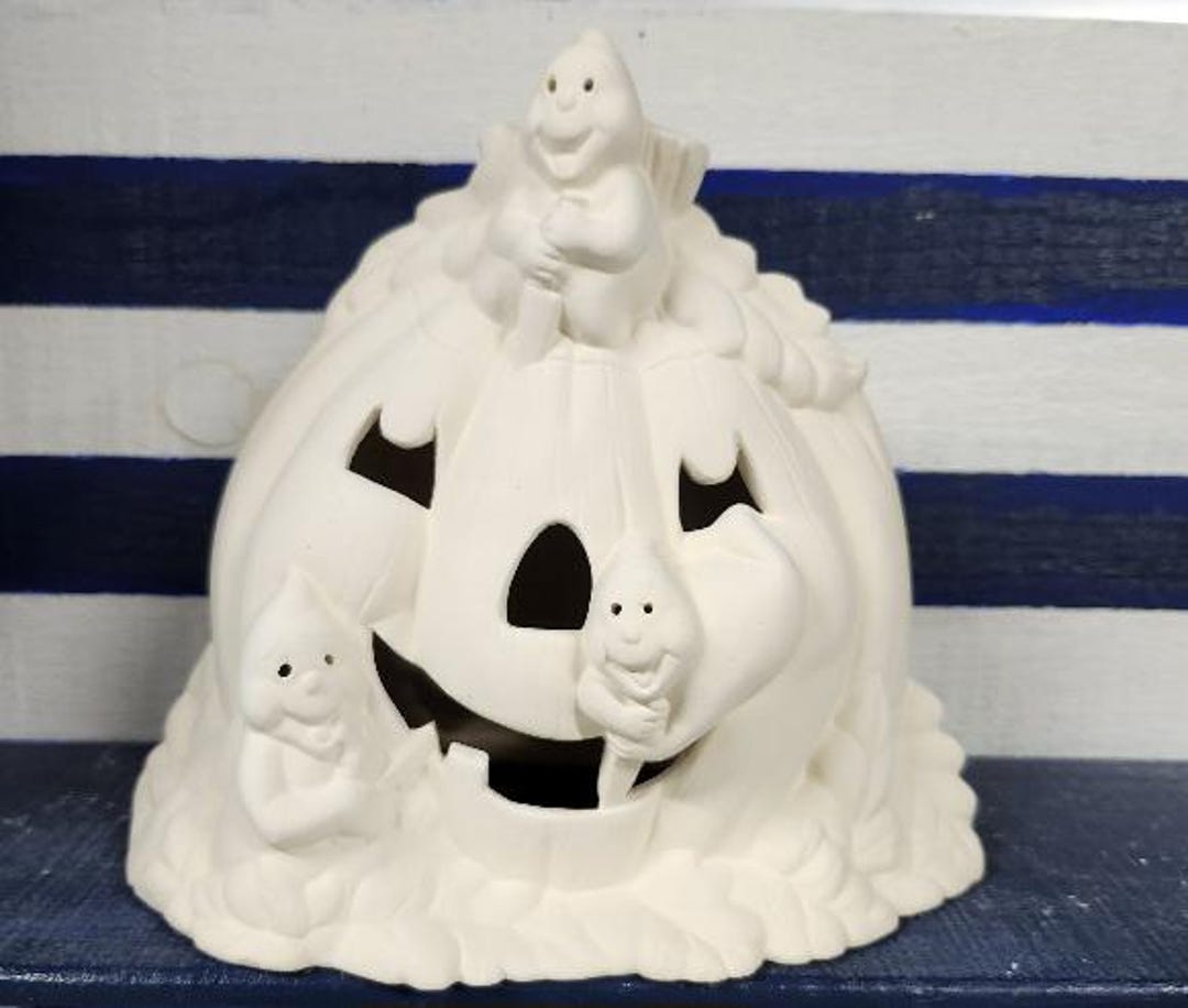 Bisque Ceramic Ghosts Carving a Pumpkin, Getting Ready for Trick-or ...