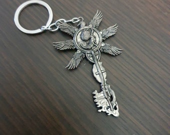 Winged Key | Etsy UK