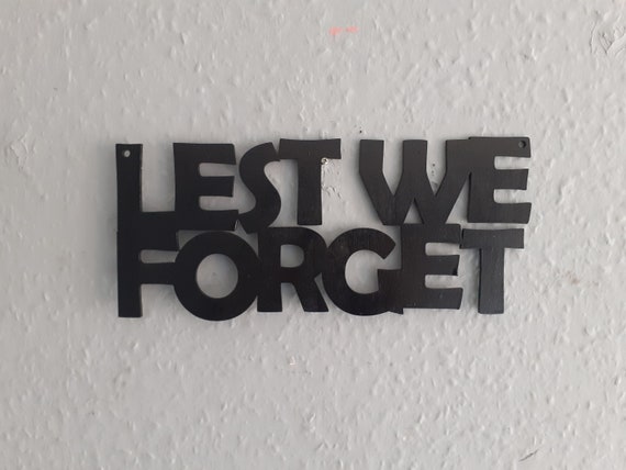 LEST WE FORGET Black Coated Wood Silhouette Wording to Wall | Etsy