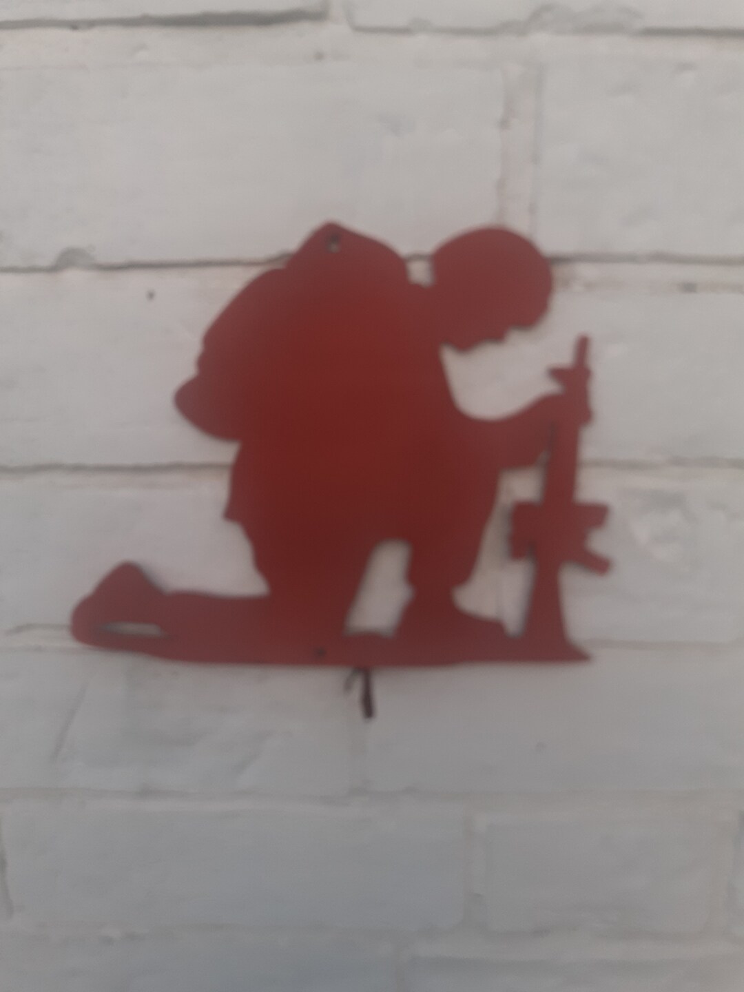 A Red Oxide Coated Wood Silhouette Memorial Kneeling Soldier Figure to ...