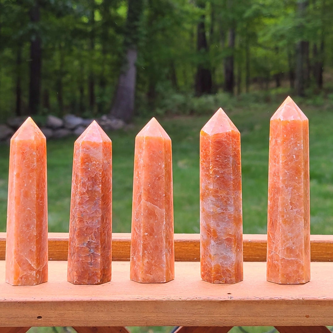 Sunstone Towers Orange Calcite Points Generators Obelisks Video Crystal ...