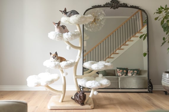 Cat climbing tree store