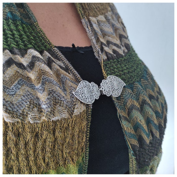 Sweater brooch store