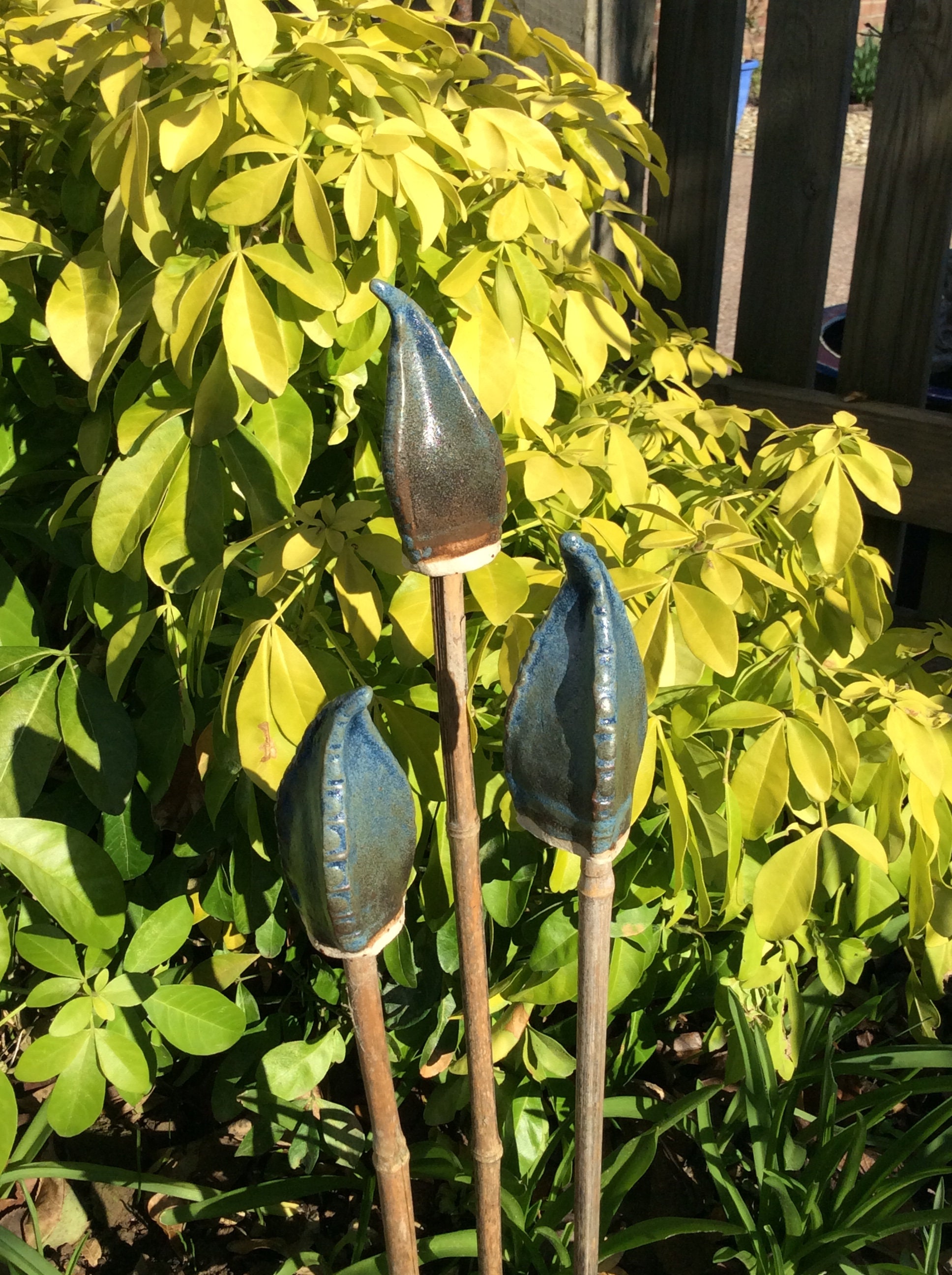 Set of three handmade ceramic garden cane toppers | Etsy