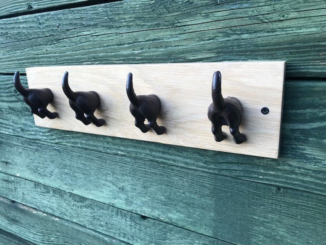 Cast Iron Dog Tail Hooks on a Waxed Oak Plinth - Etsy UK