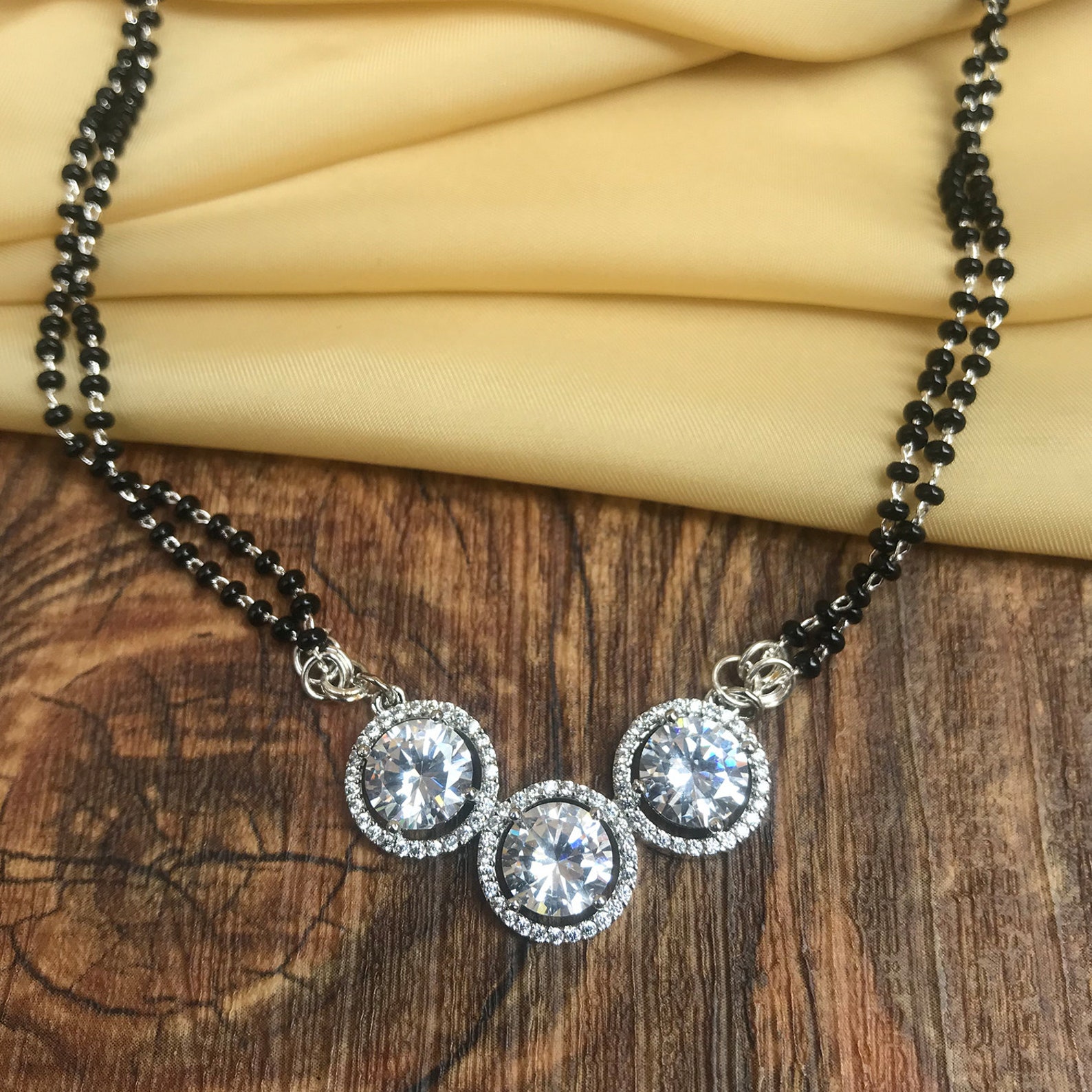 Buy Silver Solitaire Mangalsutra CZ Mangalsutra Black Beads Online in ...