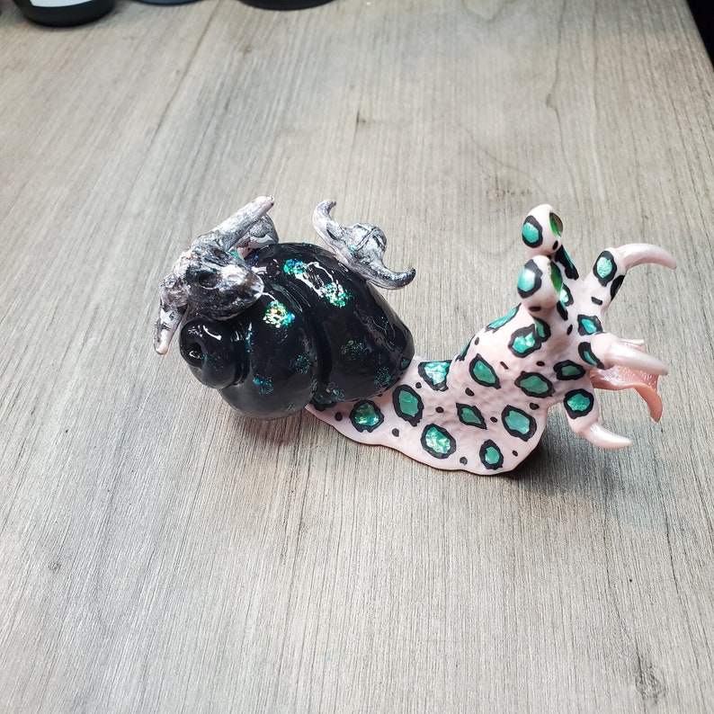 Hand Sculpted Alien Snail With Shell and Skulls - Etsy