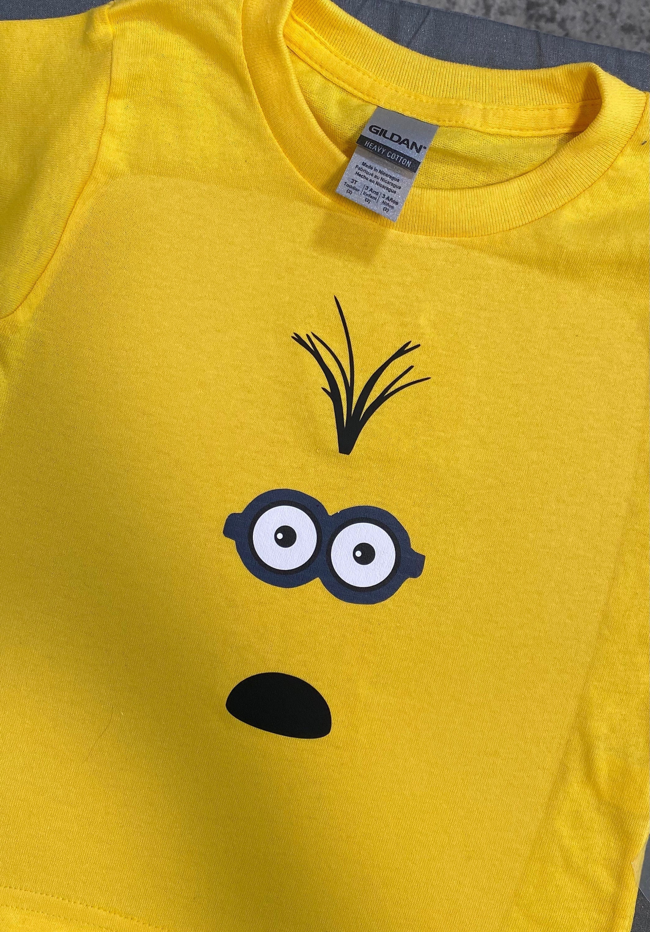 Camisa Lisa De Minion Amarilla Amazon.com: Despicable Me Camiseta