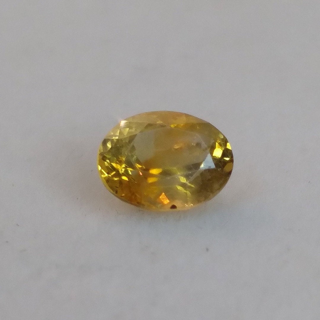 Zafiro de Montana de rock creek. .83cts 6x5mm ovalado. Piedra preciosa ...