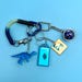 Dinosaur Keychain Set | Blue Dinosaur Charm | Spinning Globe | HOPE Tag ...