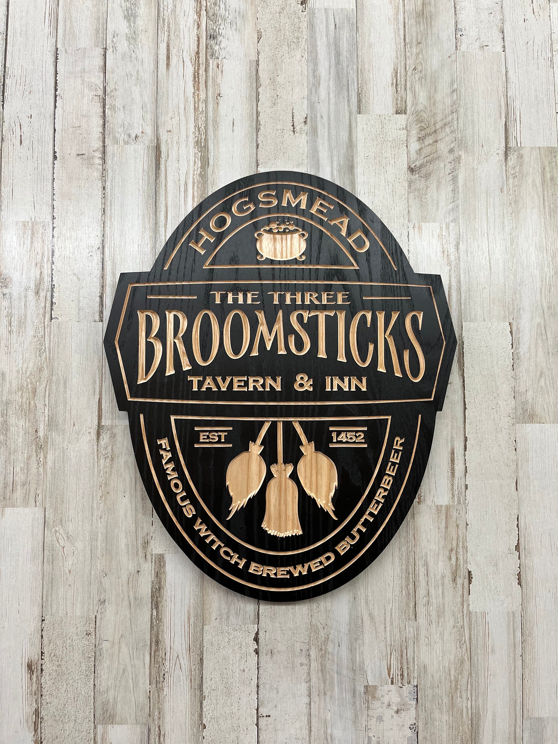The Three Broomsticks Logo