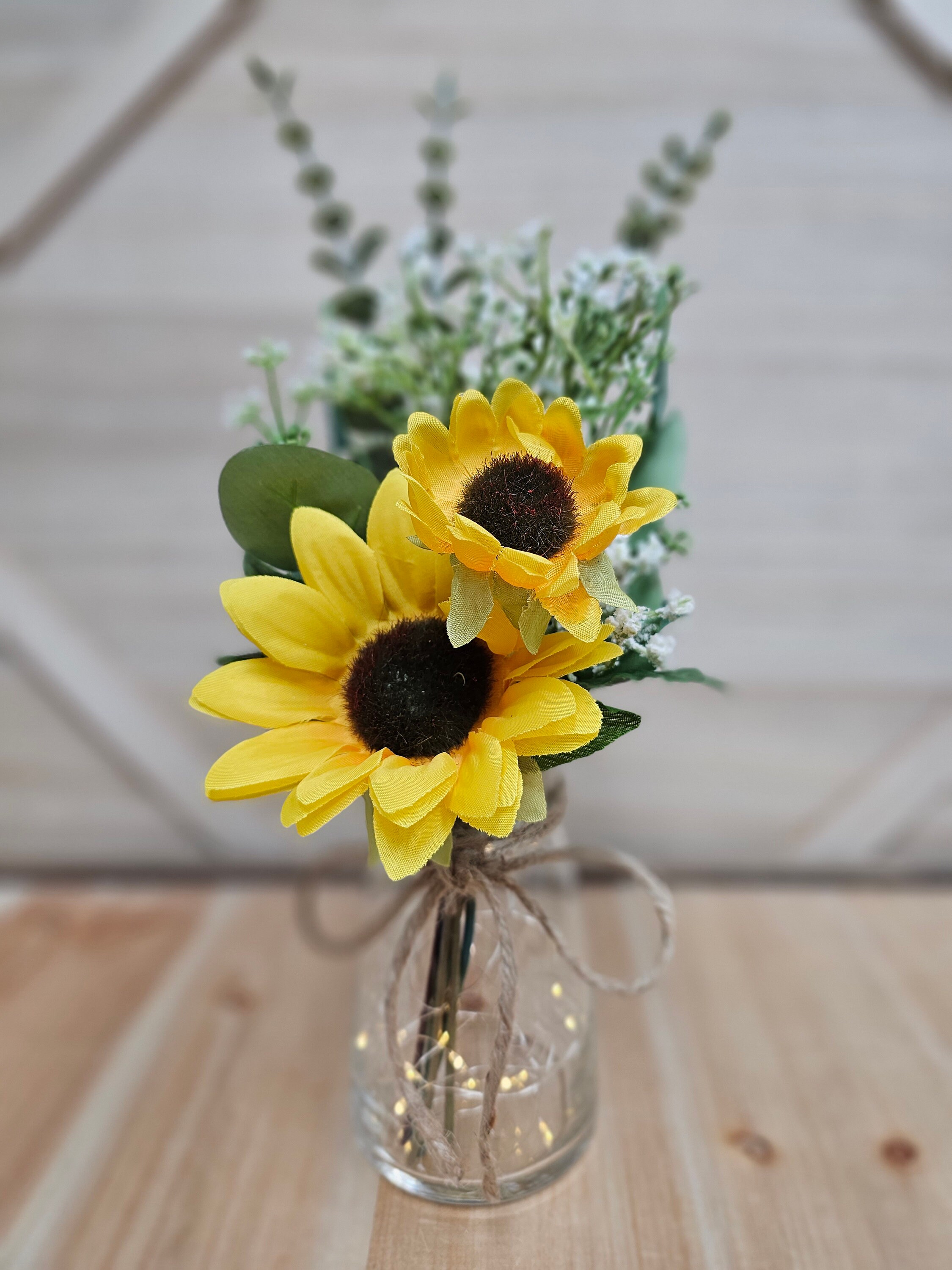 Blue Vase And Sunflower Centerpiece