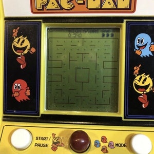 Bandai Namco Handheld Miniature Pac-man Arcade Game. Works Pre-owned W ...