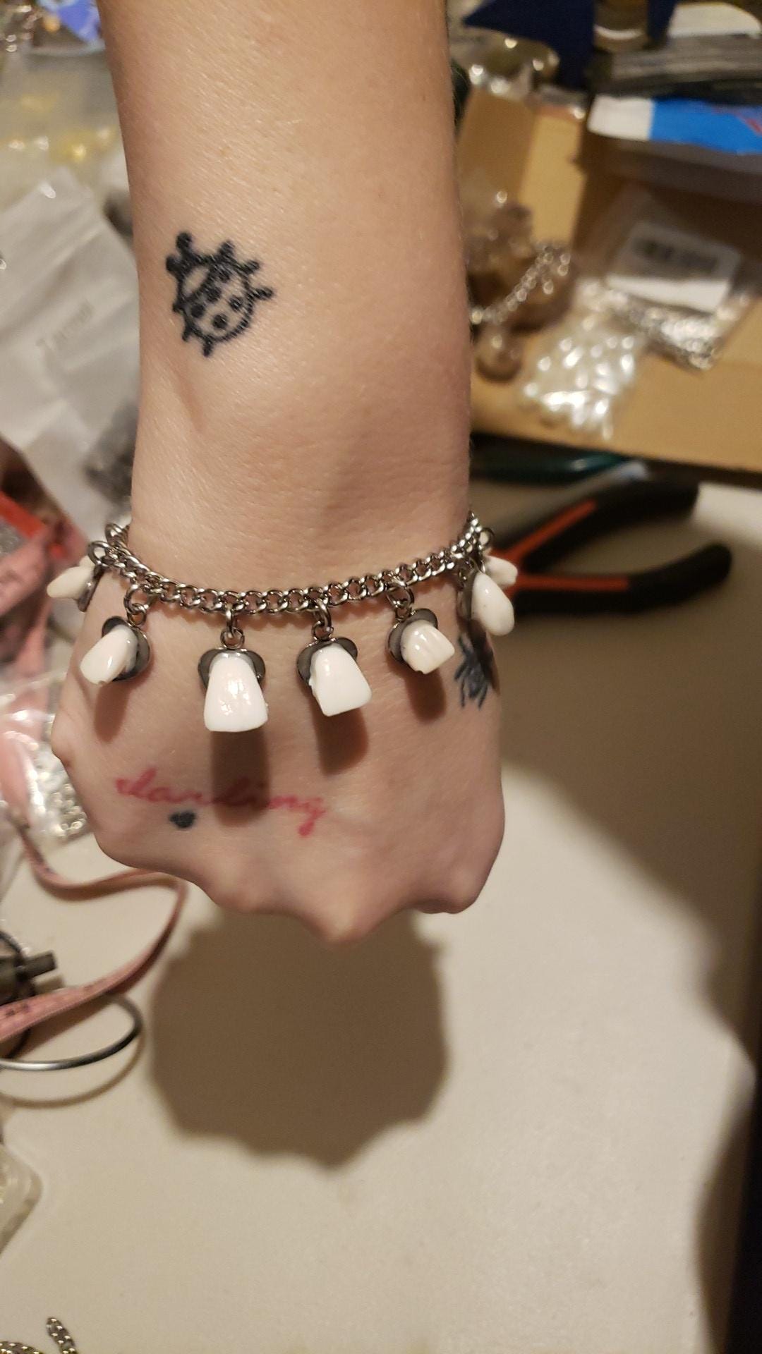 Smile Charm Bracelet With Faux Carved Human Teeth on Stainless Steel ...