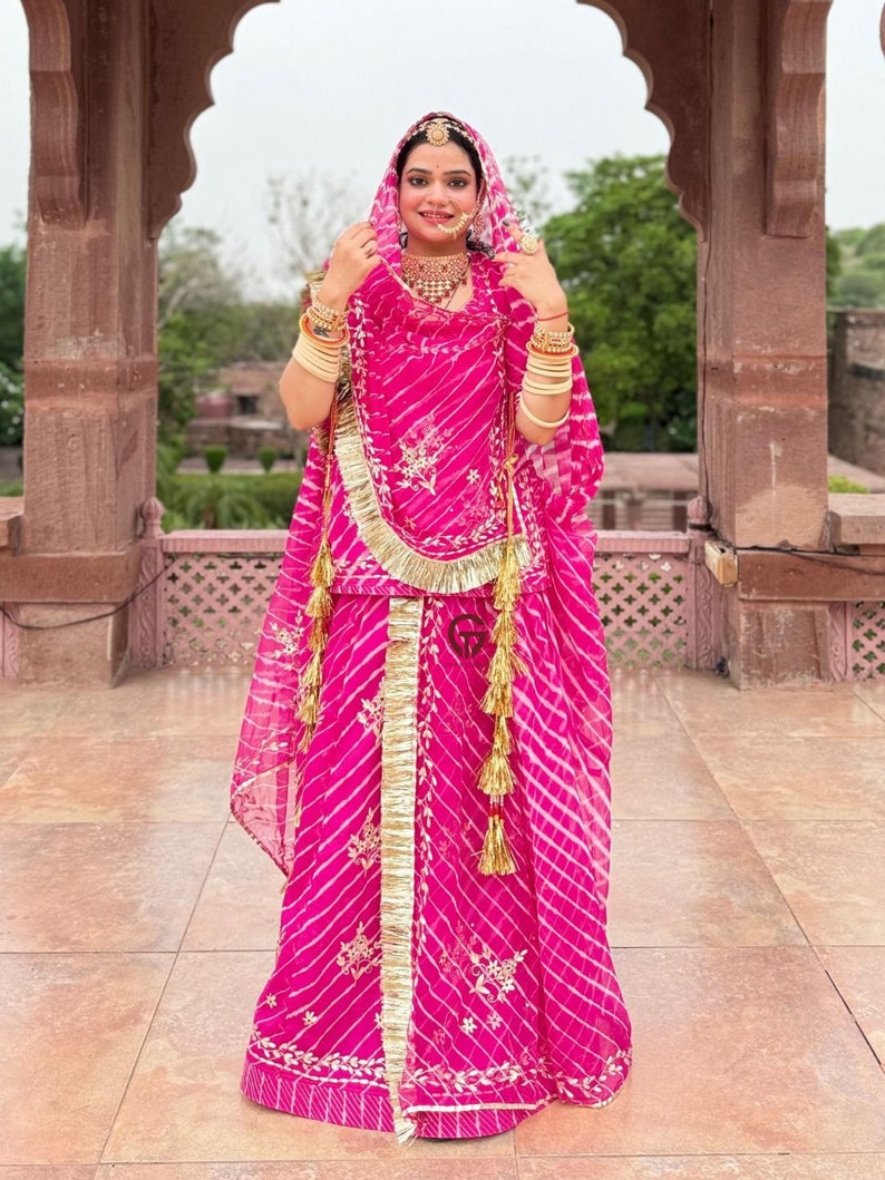 Zari Kasab Leheriya Humrahi Sawan Special Rajputi Poshak in Pink Color ...