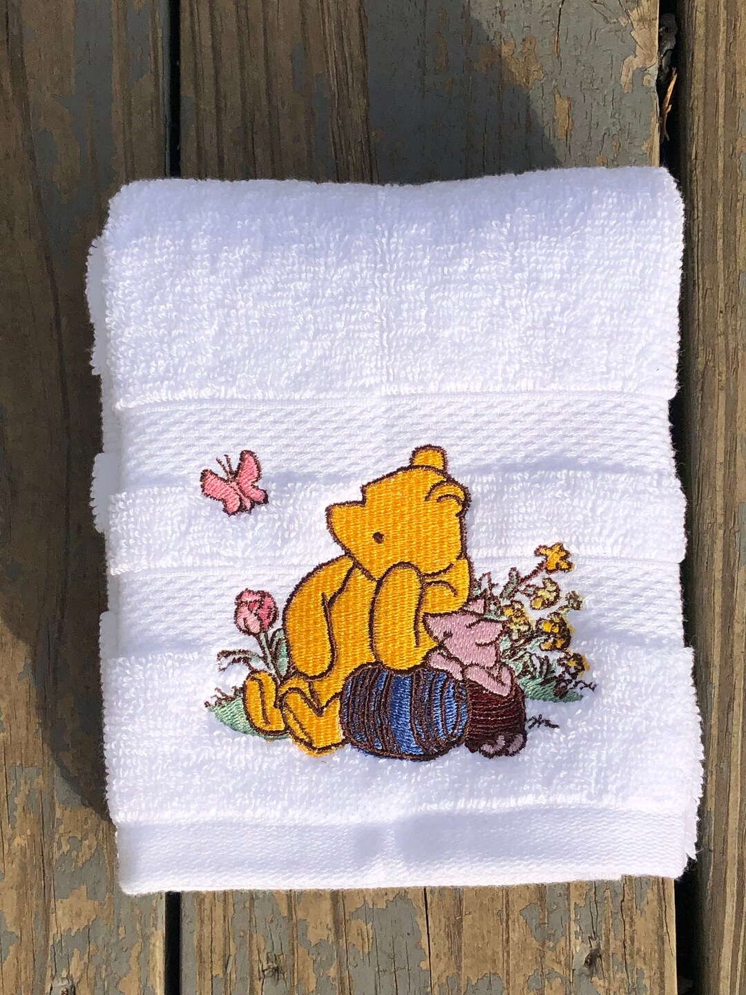 Classic Pooh With His Pink Pig Friend Resting on A Barrel Hand Towel ...