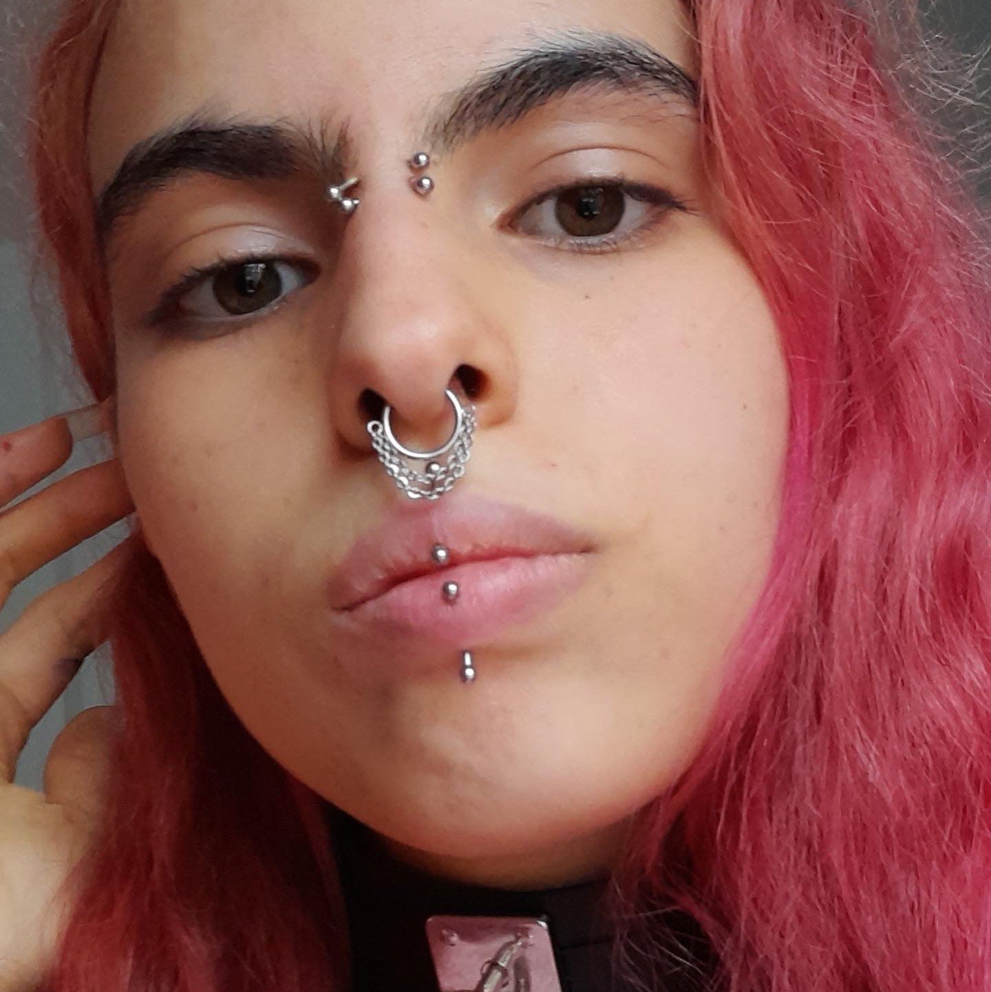 Saddle Nose From Septum Piercing