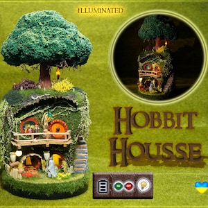 Hobbit's House With Growing Tree of Life. House With Lights Inside and ...