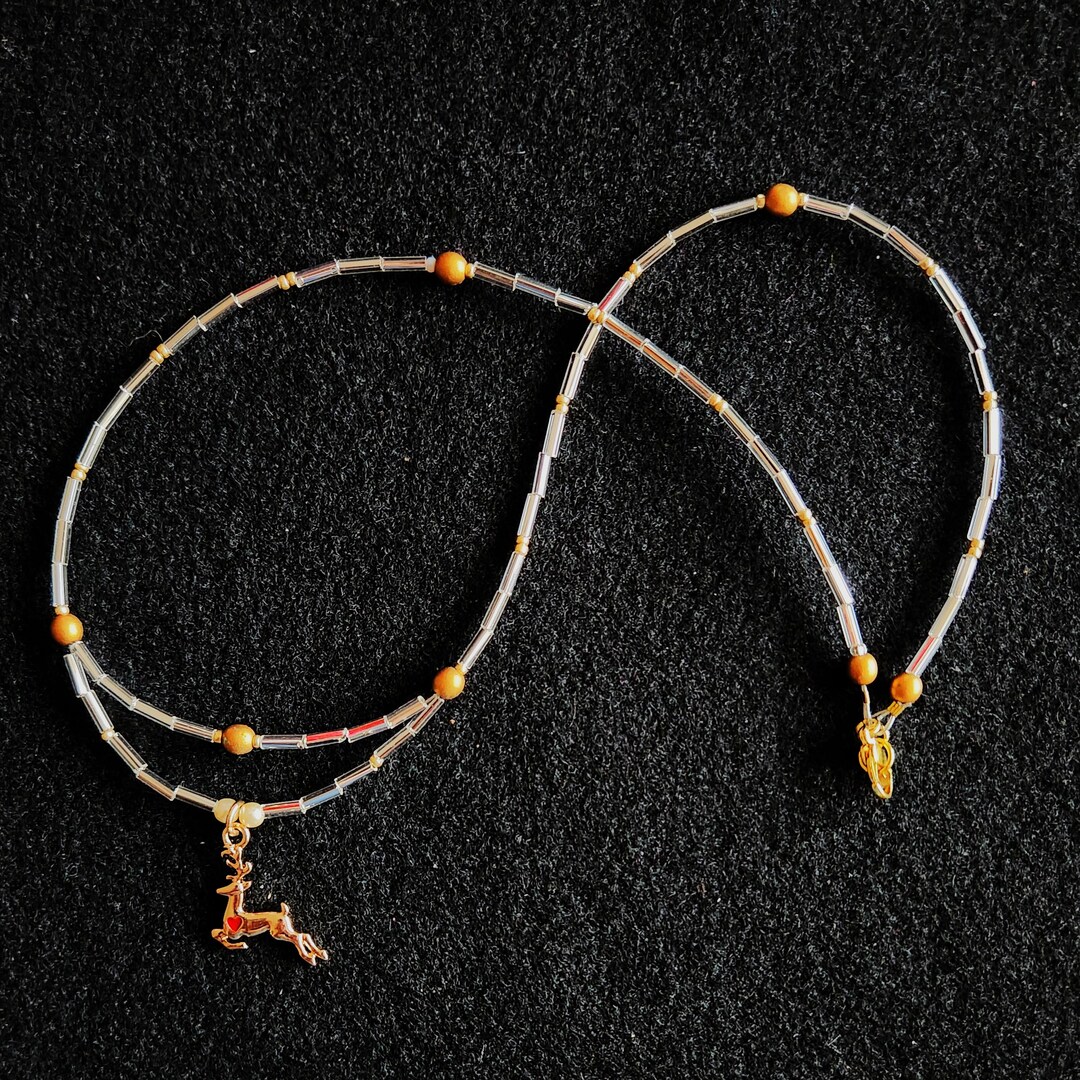 Merry and Bright | Rudolph’s Flight | Gold and Clear Reindeer Pendant ...