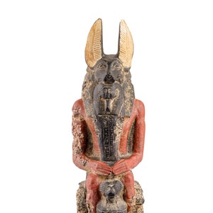 Seated Anubis Jackal Holding a Mummy Form With a Hapi son of Horus ...