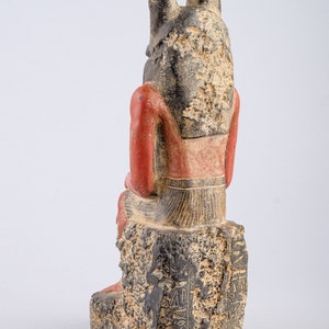 Seated Anubis Jackal Holding a Mummy Form With a Hapi son of Horus ...