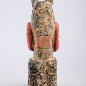 Seated Anubis Jackal Holding a Mummy Form With a Hapi son of Horus ...