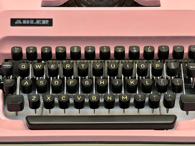 Vintage Adler Typewriter - Pink With Black QWERTY Keyboard - Elegant ...