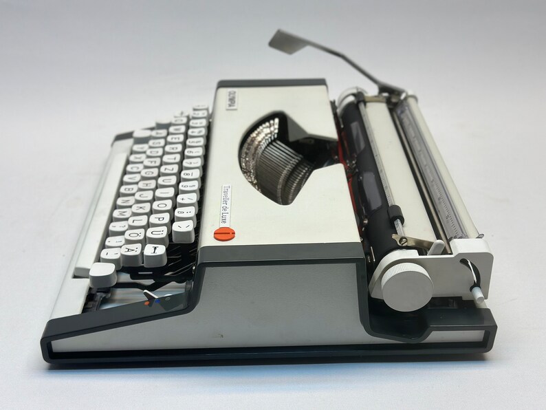 Capture Vintage Elegance With the Olympia Traveller Typewriter - German ...
