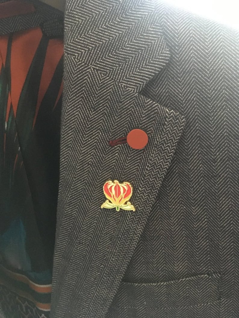 Kaarthikai Poo Badge - Etsy