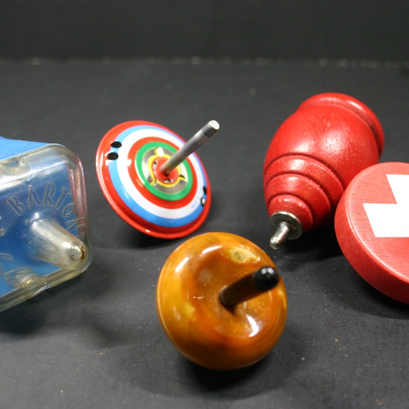 Wooden Spinning Tops - Etsy