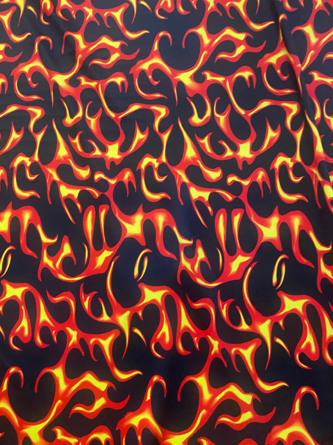 Flames/fire on Black Base Nylon Spandex Four Way Stretch Fabric Sold by ...
