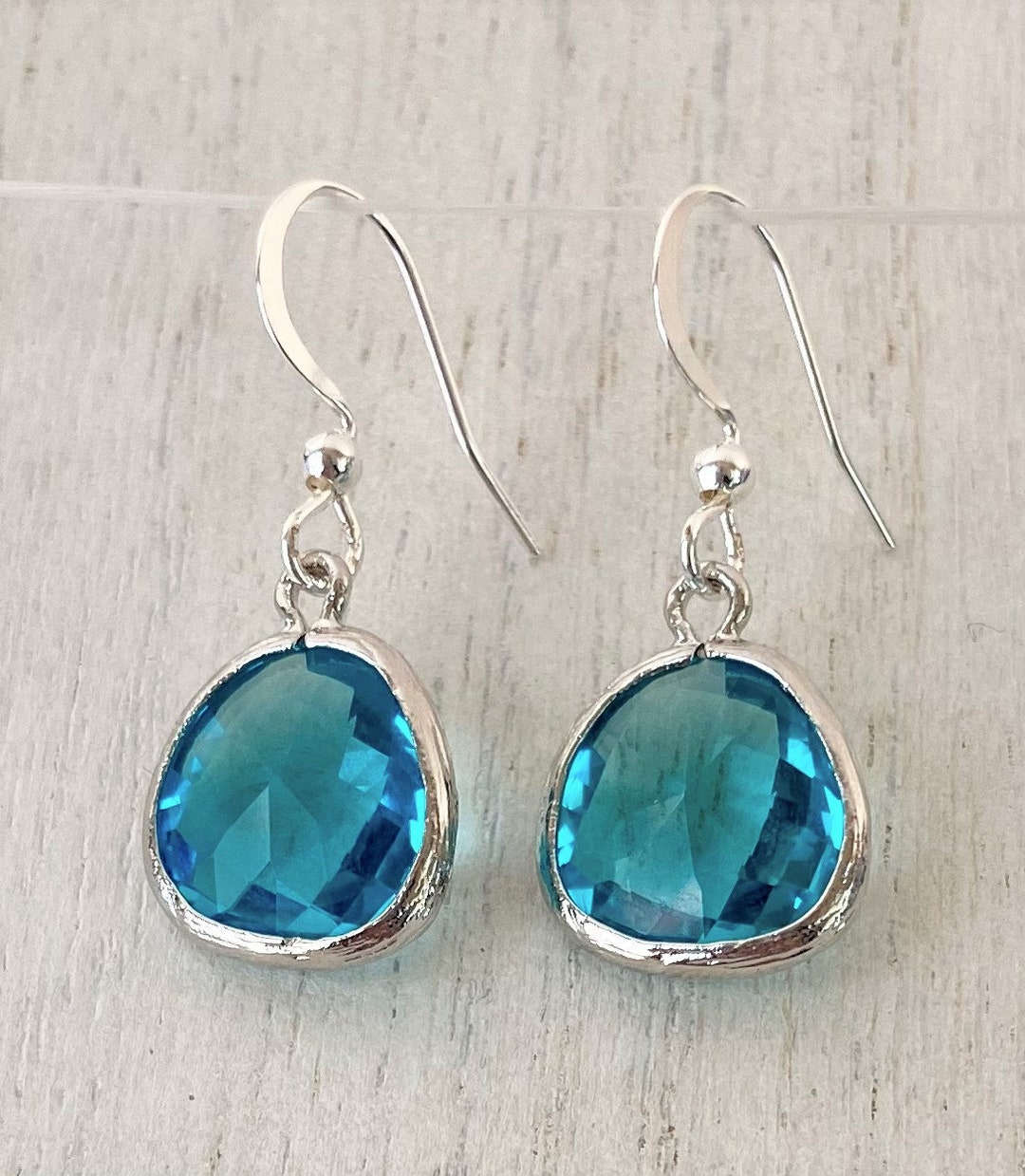 Turquoise Color Glass and Polished Rhodium Plated Frame Earrings ...