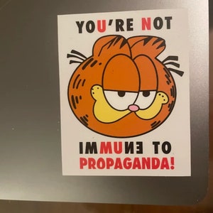 Propaganda Garfield Sticker You're Not Immune to Propaganda Garfield ...