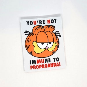 Propaganda Garfield Sticker You're Not Immune to Propaganda Garfield ...