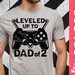 Leveled up to Dad of 2 New Father Svg Dad Gamer Shirt Design Gaming Dad ...