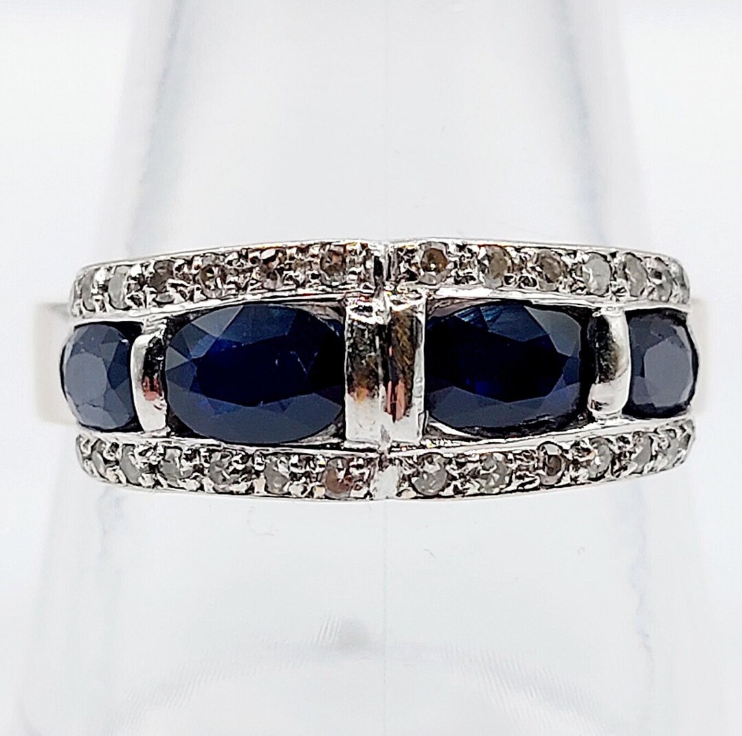 French Garter Ring 18k White Gold Set With Sapphires Surrounded by ...