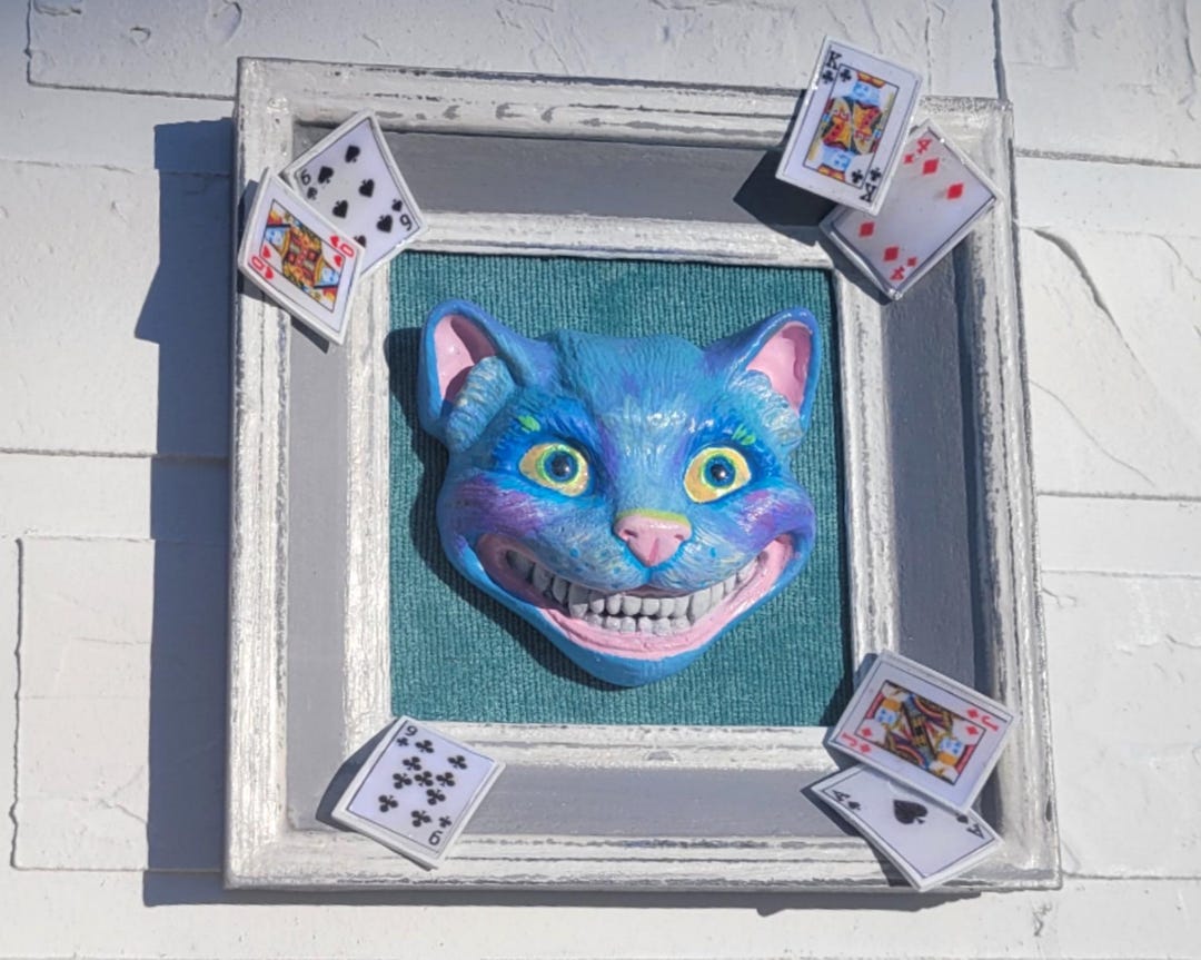 Smiling Cheshire Cat in a Wonderland Frame | Cheshire Cat Head |smiling ...