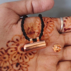 Brass Taweez With Black Thread, Brass Locket Pendant, Brass Kavach ...