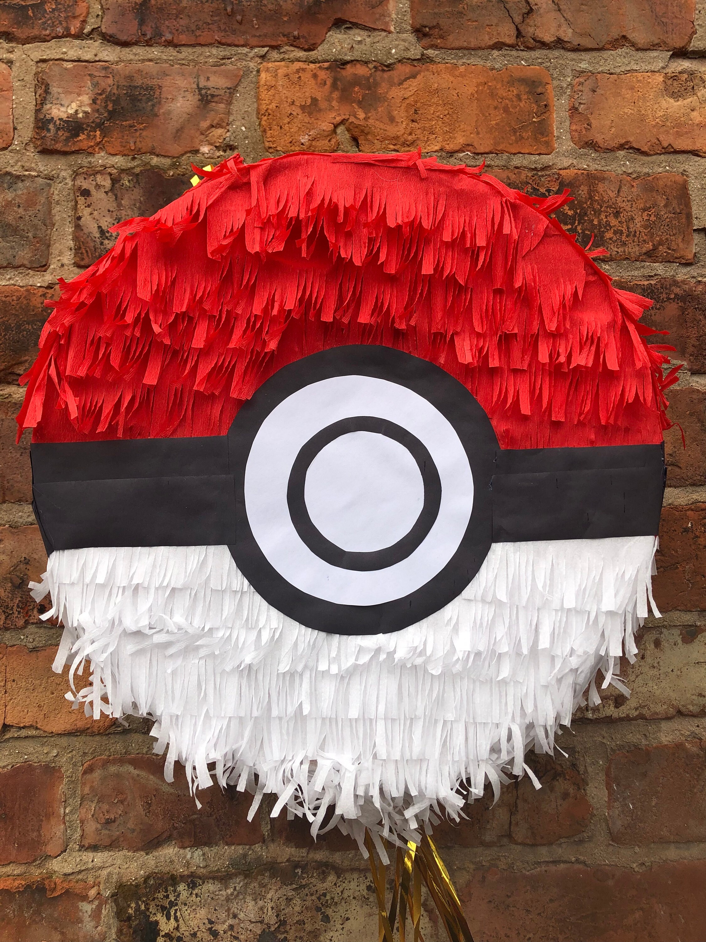 Pokeball piñata & wooden piñata stick - Etsy Italia
