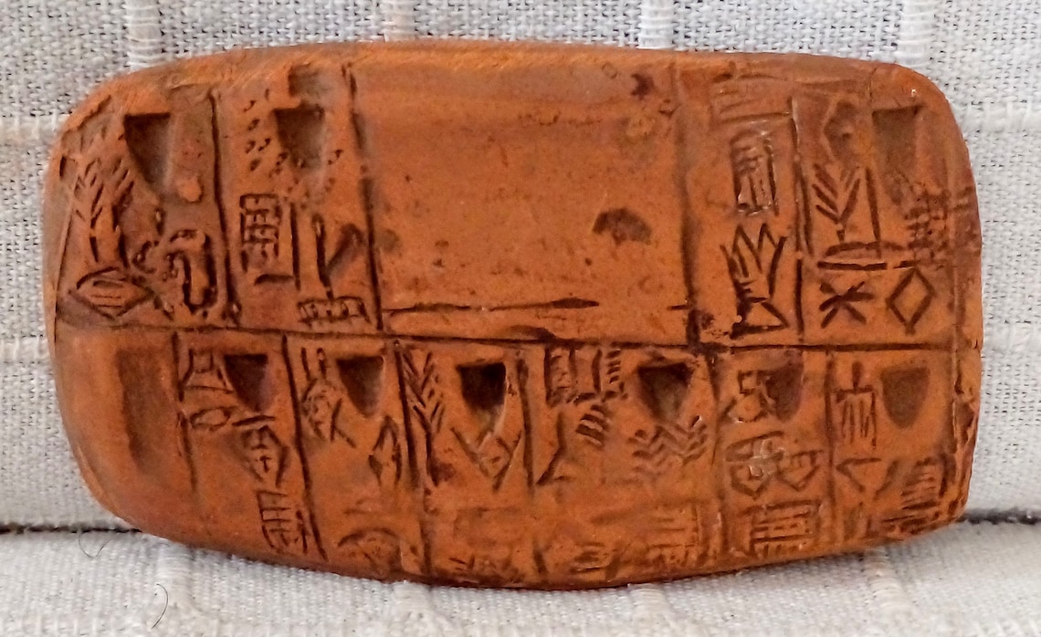 Clay Tablet Inscribed With an Archaic Pictographic Script. Originating ...