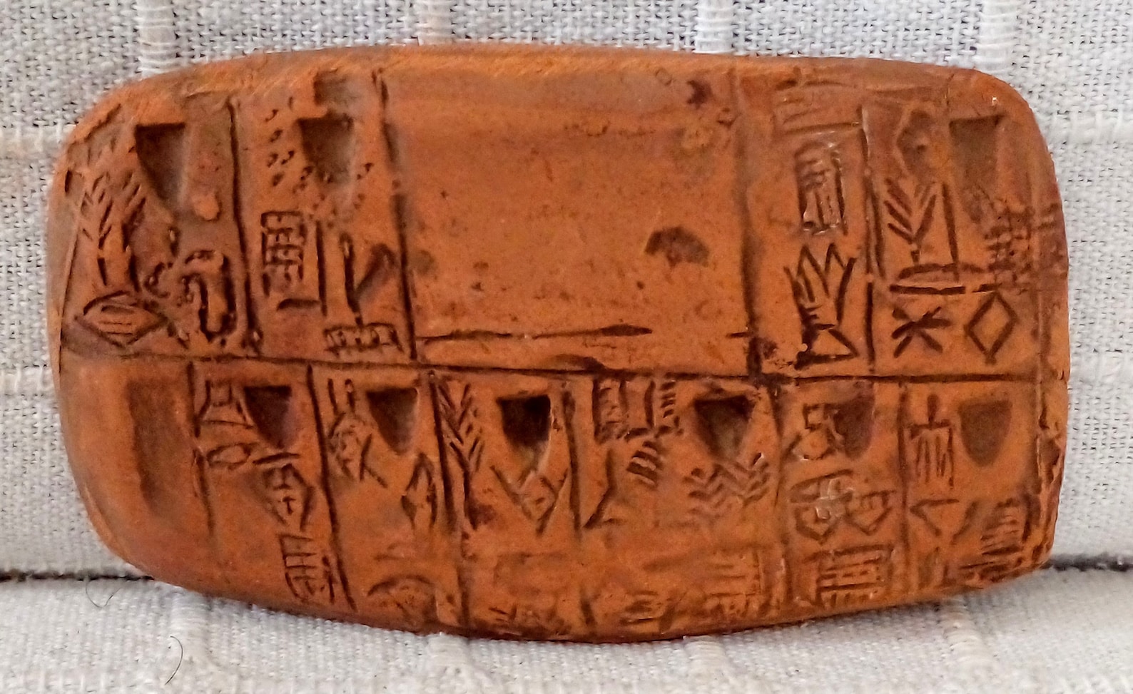 Clay Tablet Inscribed With an Archaic Pictographic Script. Originating ...