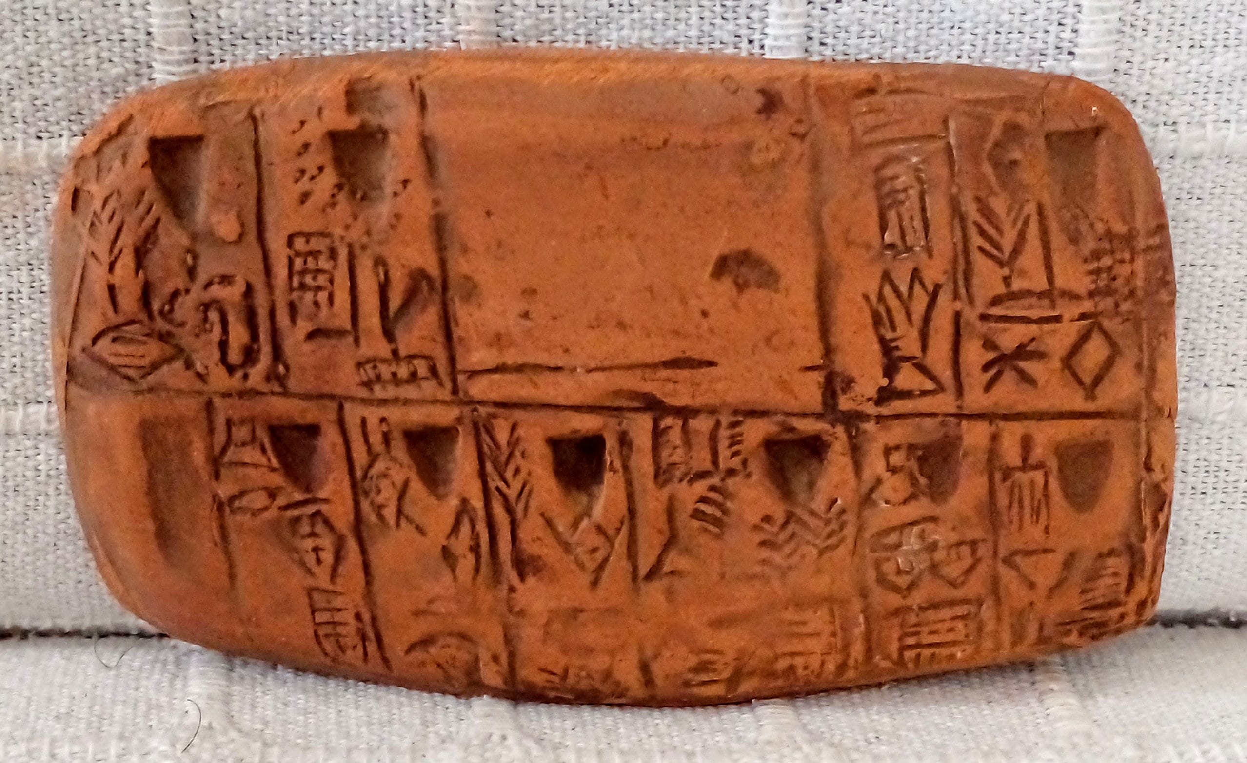Clay Tablet Inscribed With an Archaic Pictographic Script. Originating ...