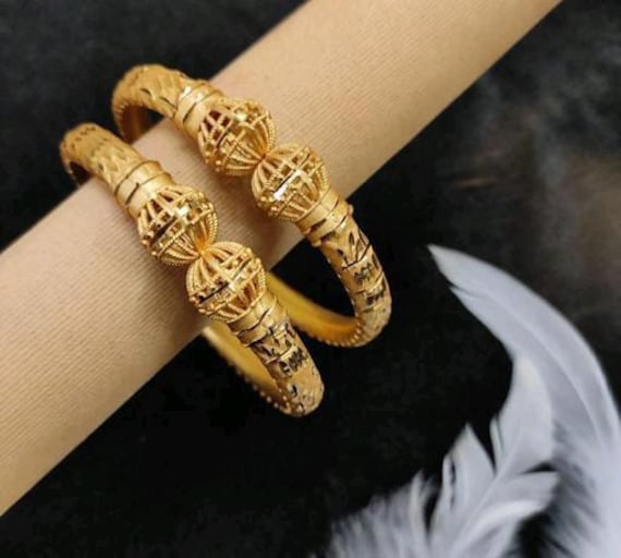 Gold bala bangles store